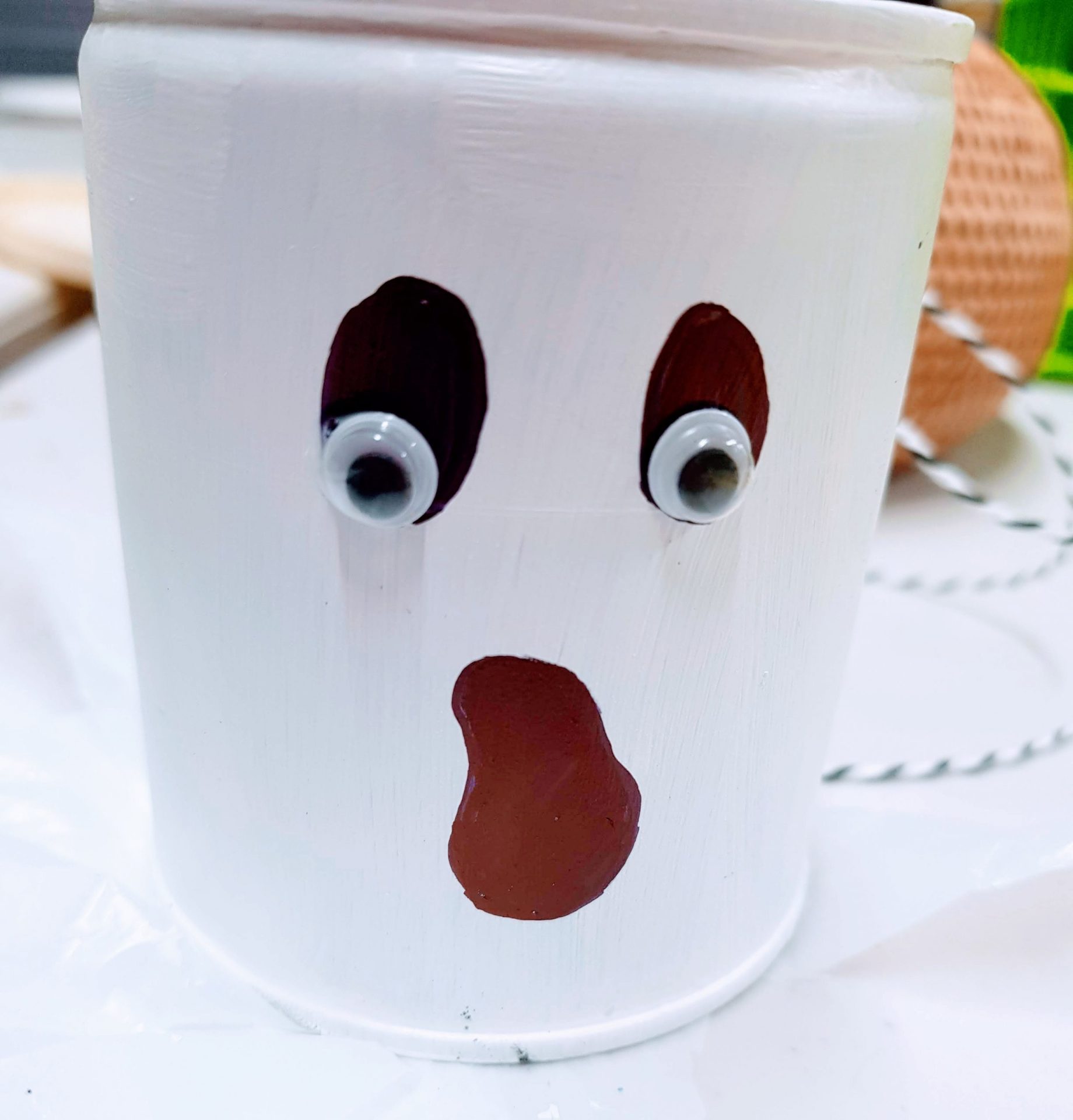 Halloween craft - upcycled tin ghosts and egg carton bat - Kiwi Families